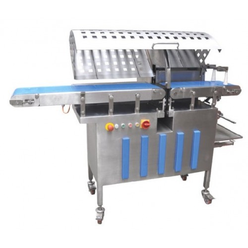 Portioning and sausage tying machine